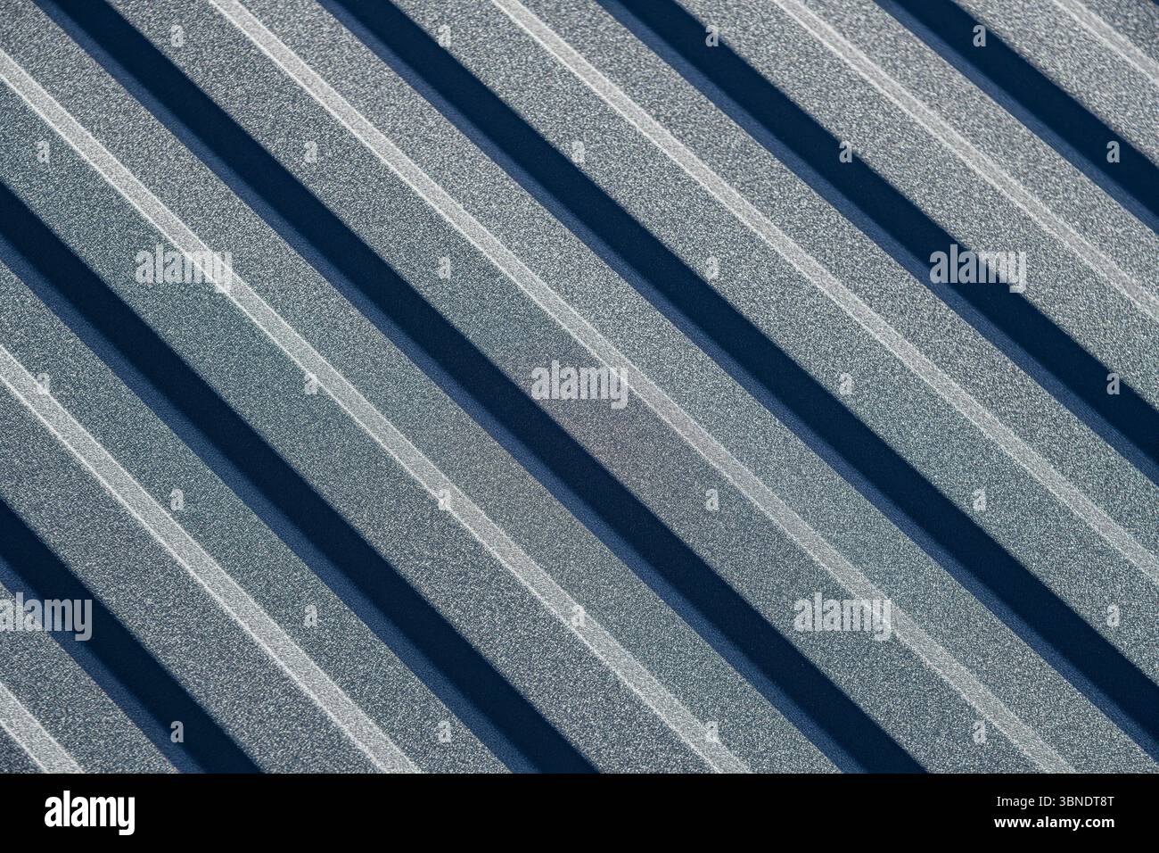 Corrugated metal sheet surface with diagonal ridges Stock Photo - Alamy