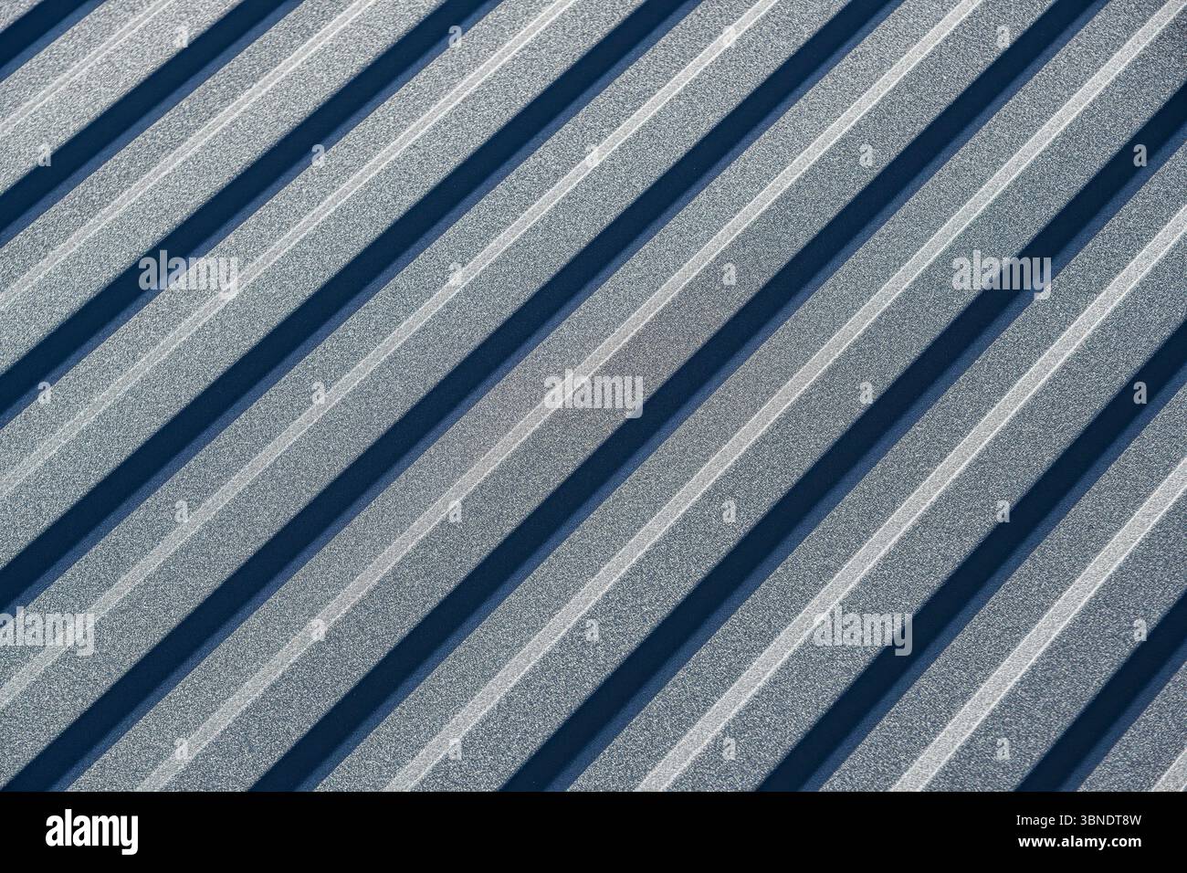 Corrugated metal sheet surface with diagonal ridges Stock Photo - Alamy