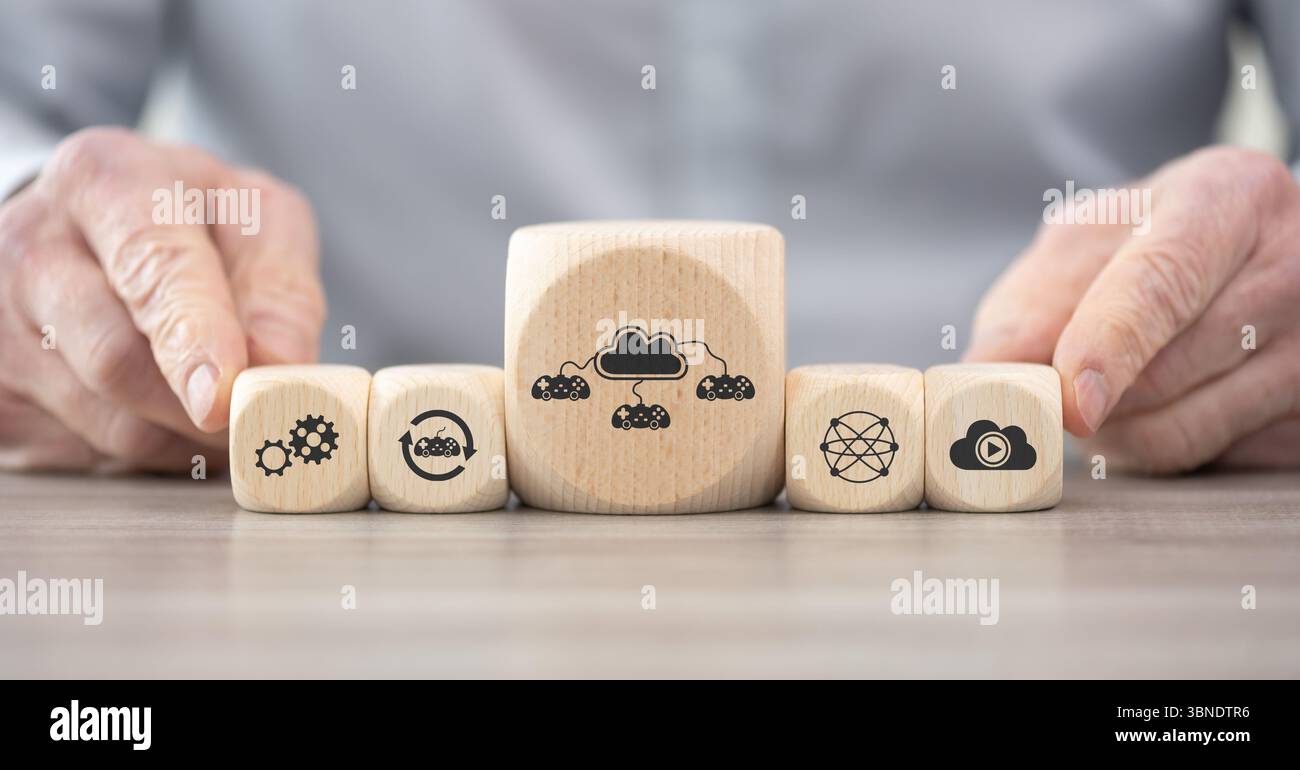 Wooden blocks with symbol of cloud gaming concept Stock Photo - Alamy