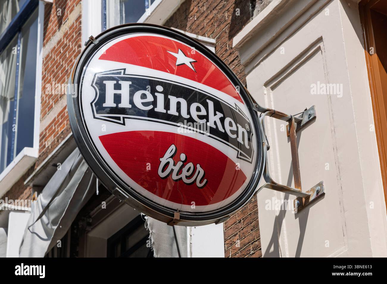 A classic red Heineken beer logo sign, featuring the iconic red star ...