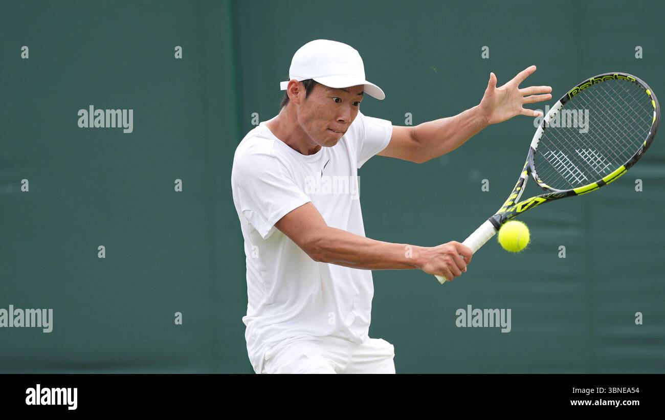 Chun-Hsin Tseng of Taiwan during their first round match of the ...