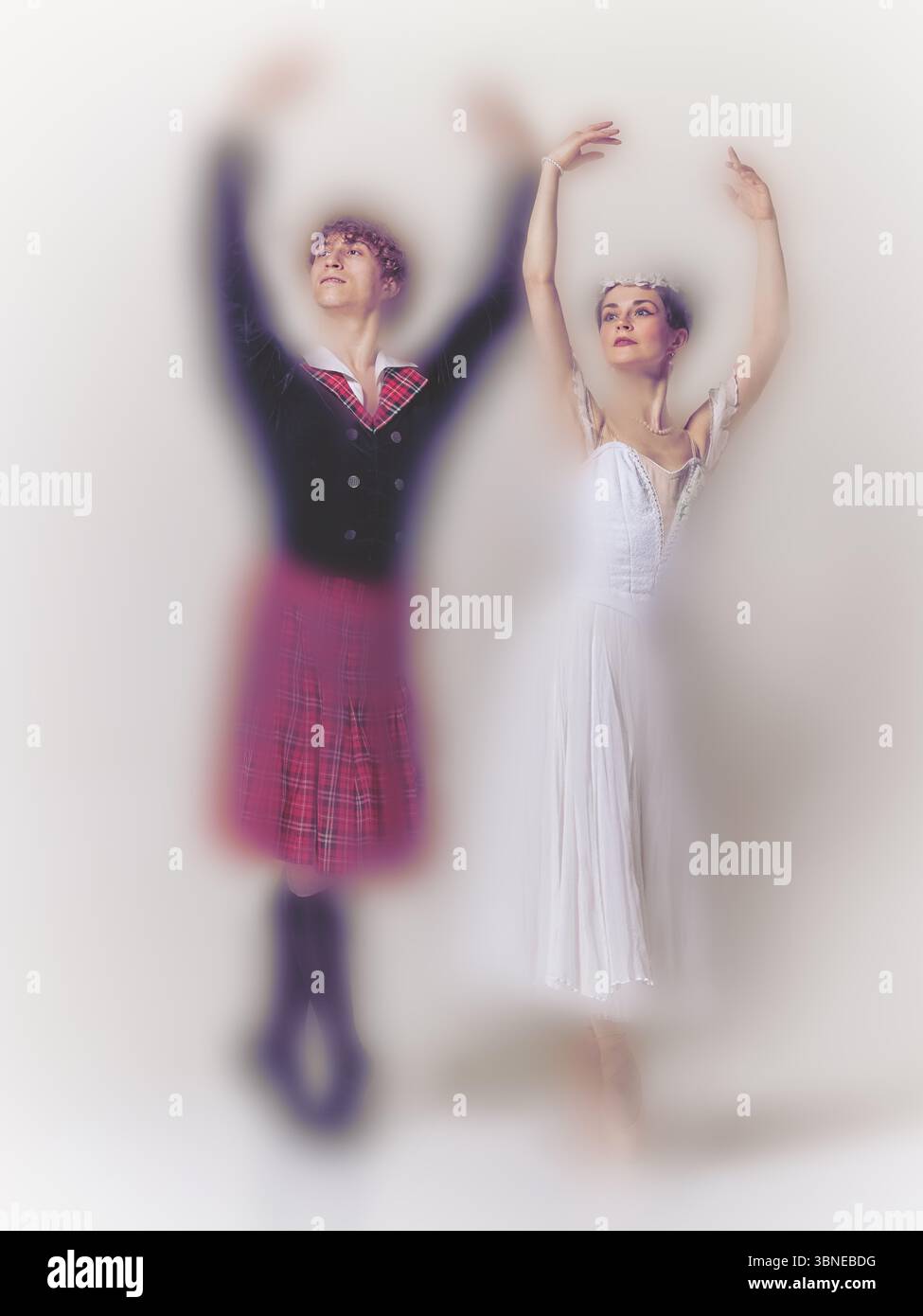 Romantic ballet duo with traditional costume and light blur Stock Photo ...