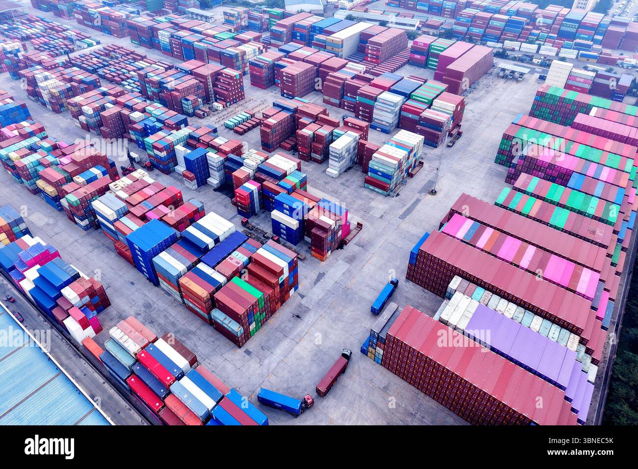 Foreign trade containers piled up in a logistics company's yard in ...