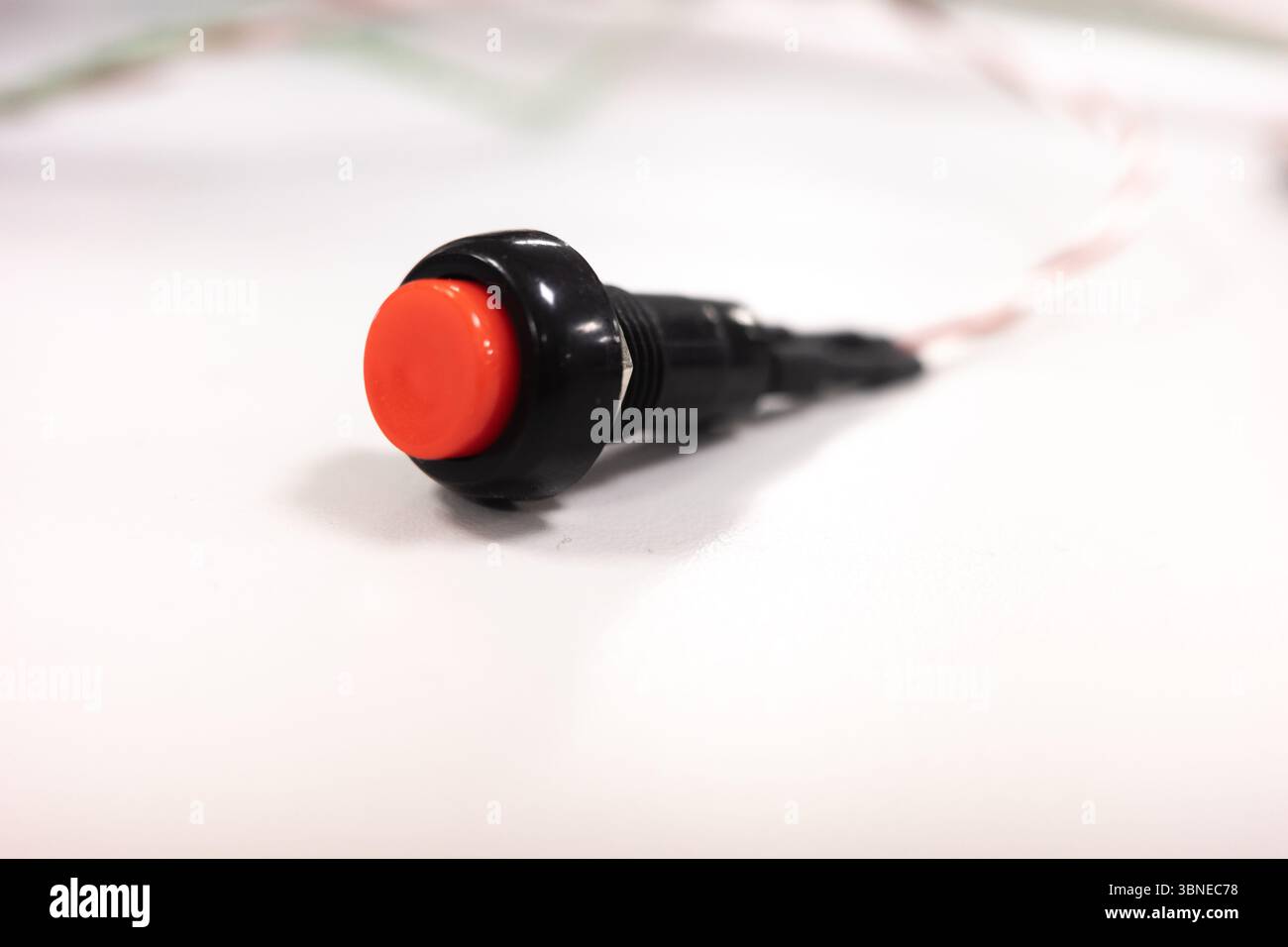Close-Up of Red Push Button Switch on White Background Stock Photo - Alamy