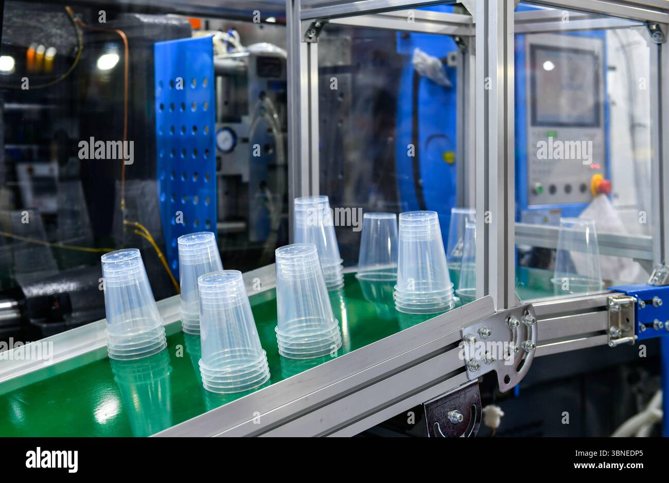 Plastic cup production line modern hi-res stock photography and images ...