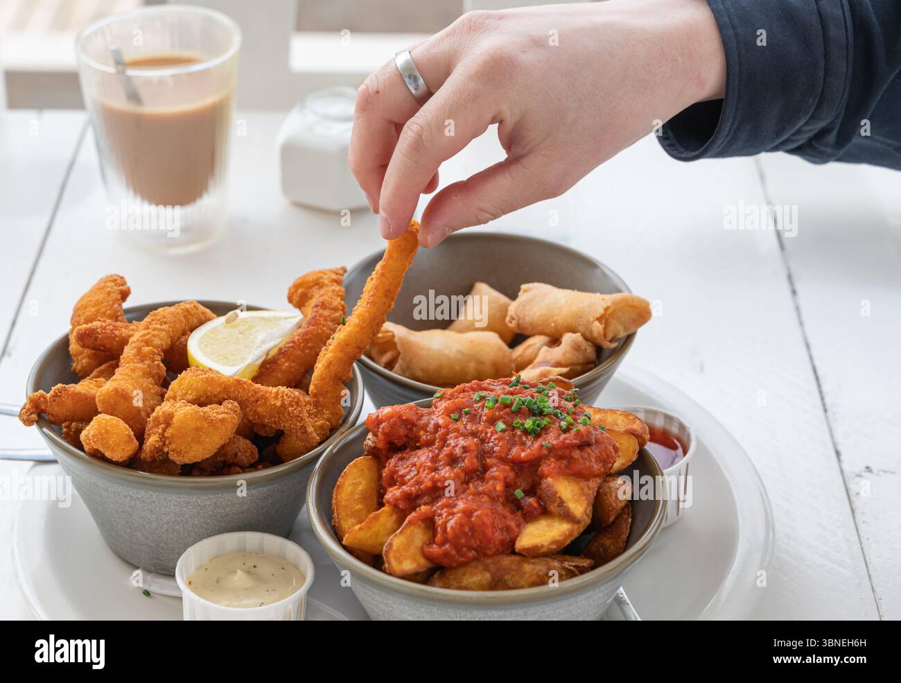 A visually tempting platter featuring crispy fried shrimp, golden ...