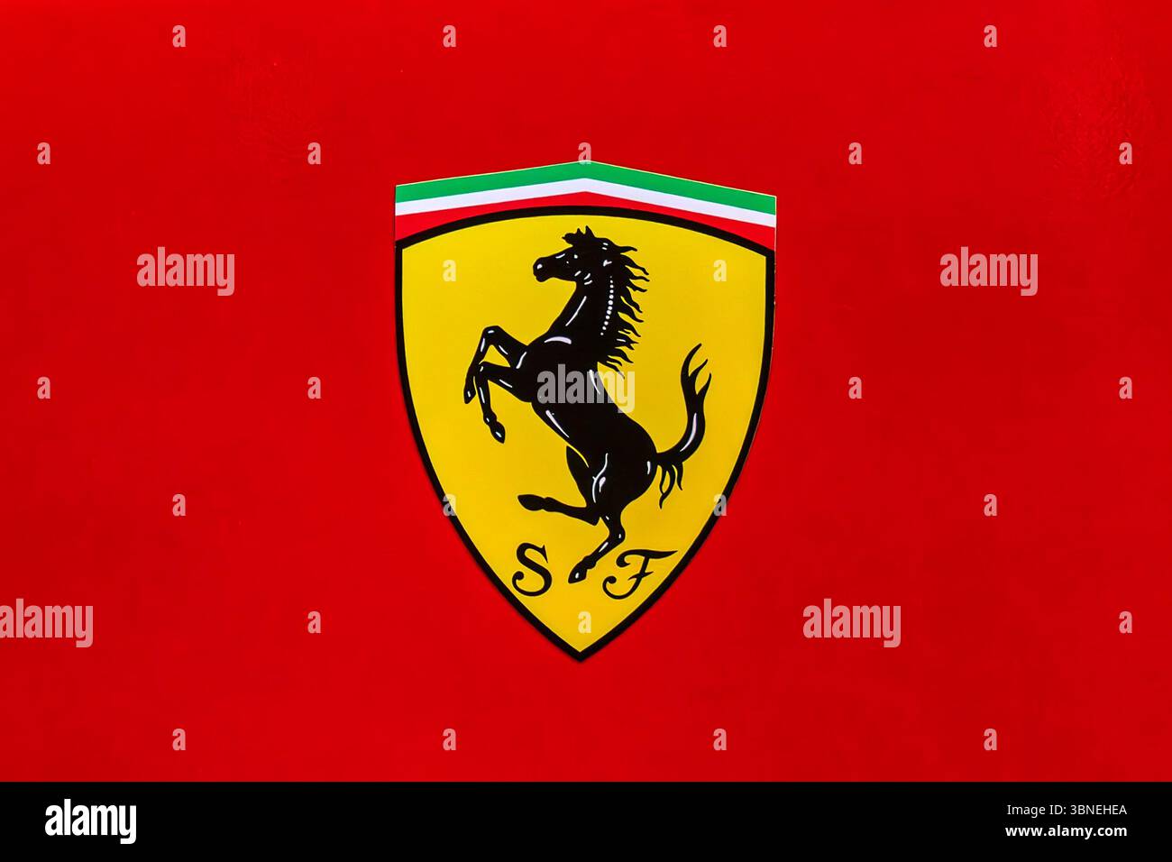 February 2, 2025, Qatar Doha. Close-up of the Ferrari logo on a red car ...