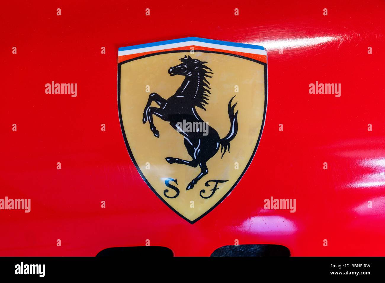 February 1, 2025, Qatar Doha. Close-up of the Ferrari logo on a red car ...