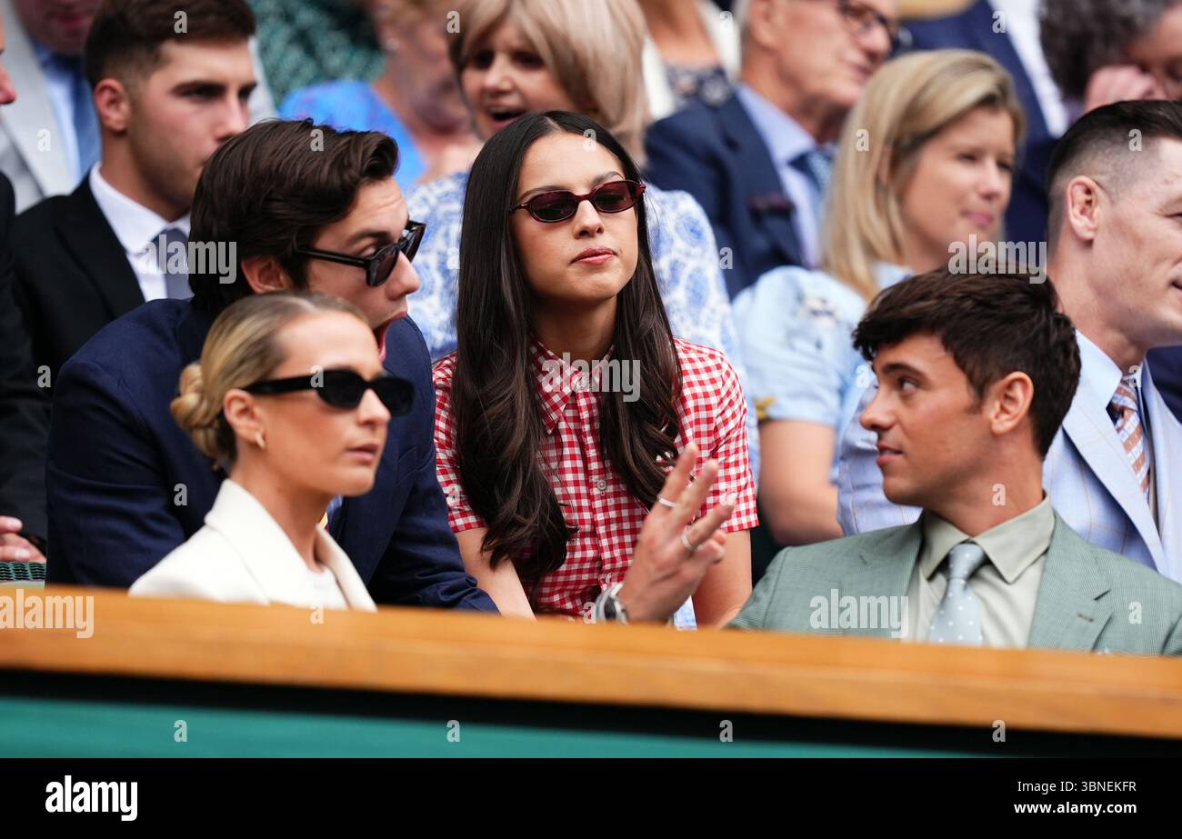 Olivia Rodrigo with Louis Partridge and Tom Daley in the Royal Box on ...
