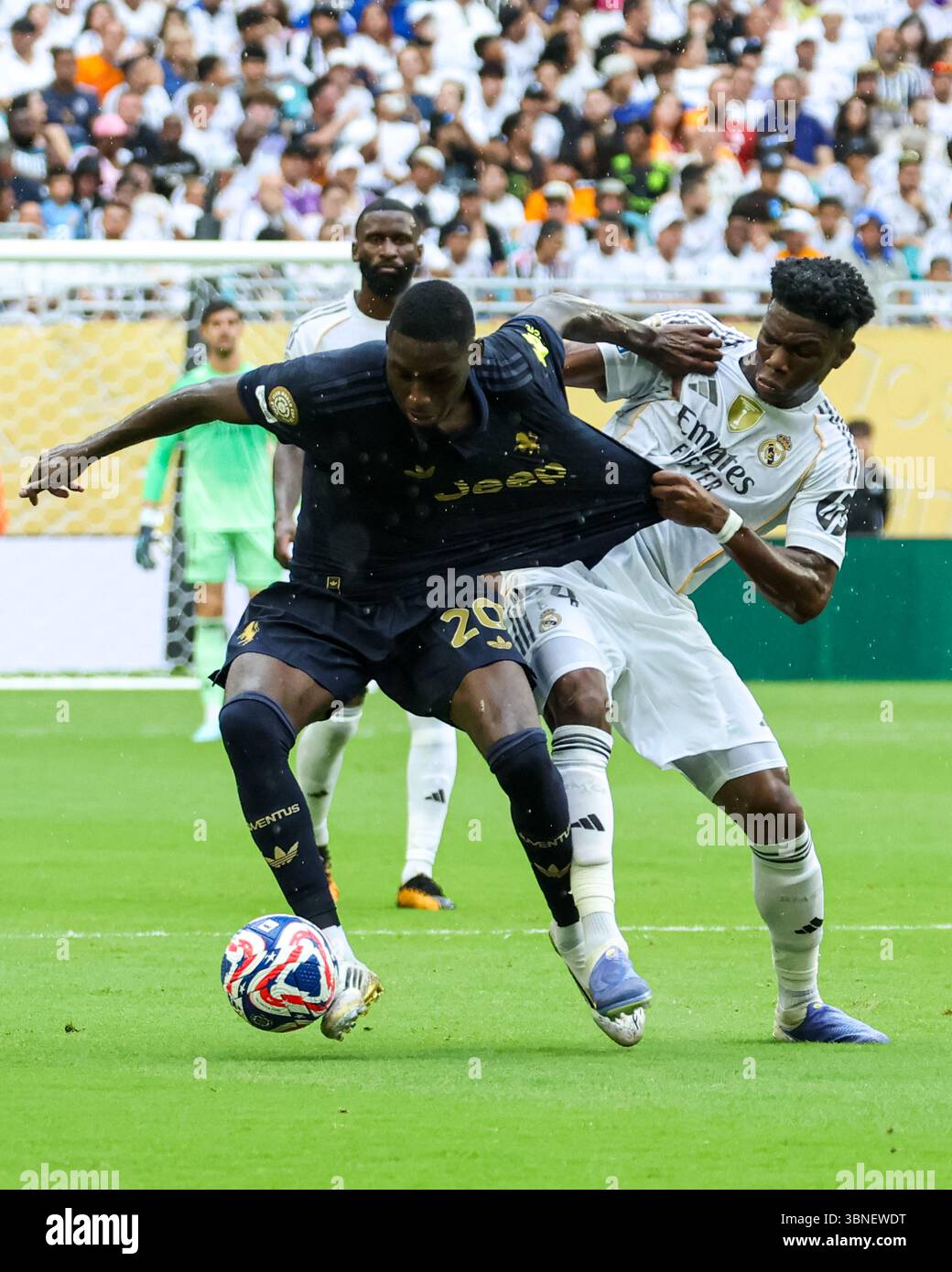 Randal Kolo Muani of Juventus fights off Aurélien Tchouaméni of Real ...