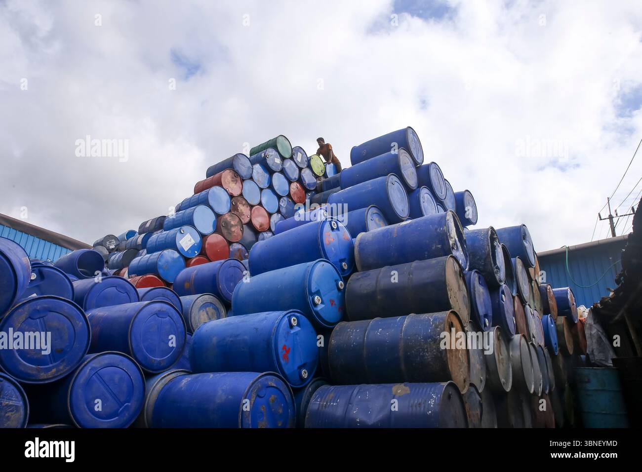 July 2, 2025, Chittagong, Chittagong, Bangladesh: Empty plastic drums ...