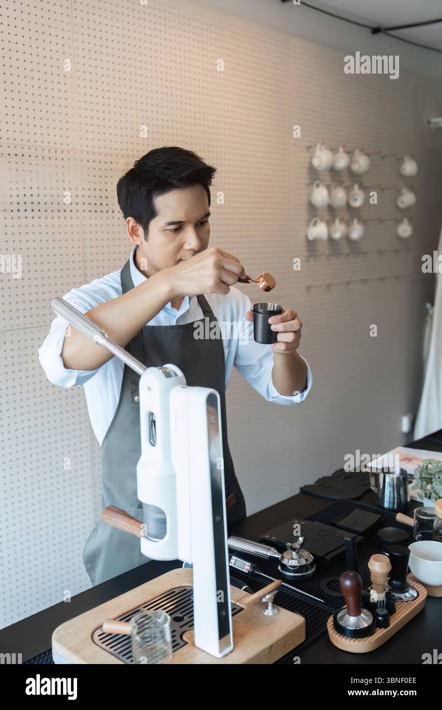 Specialized Coffee Preparation. A skilled barista expertly measuring ...