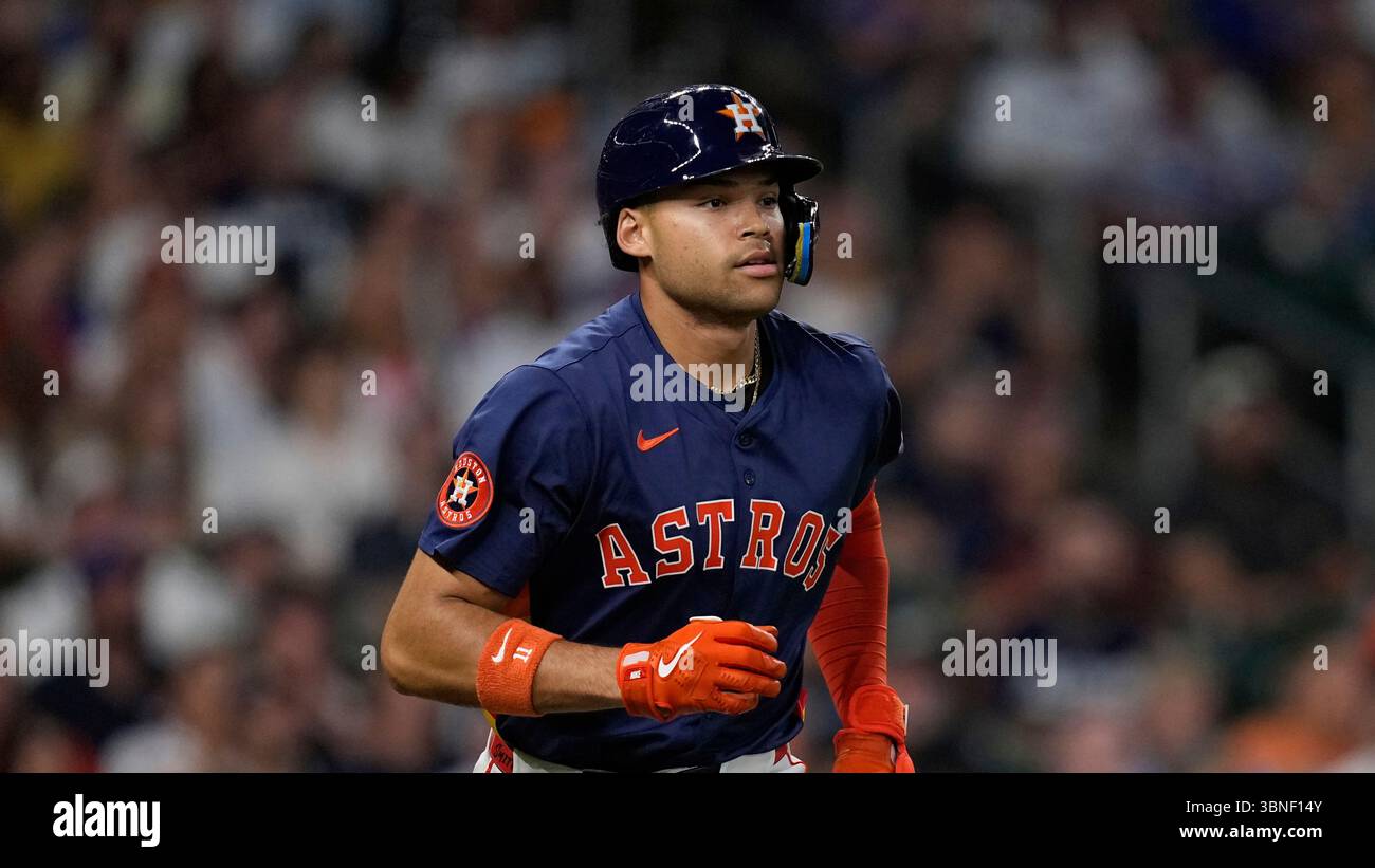 Houston Astros' Cam Smith runs up the first base line against the ...