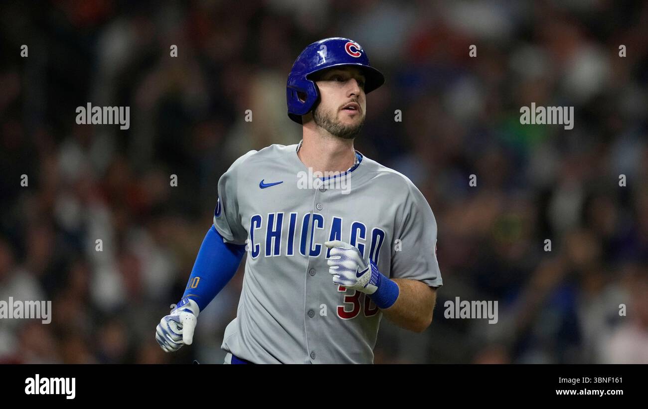 Chicago Cubs' Kyle Tucker (30) runs to first during a baseball game ...