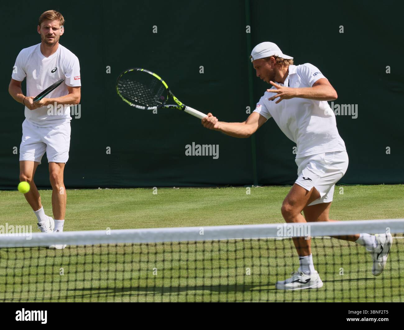 London, UK. 02nd July, 2025. Belgian David Goffin (L) and Luxembourgish ...