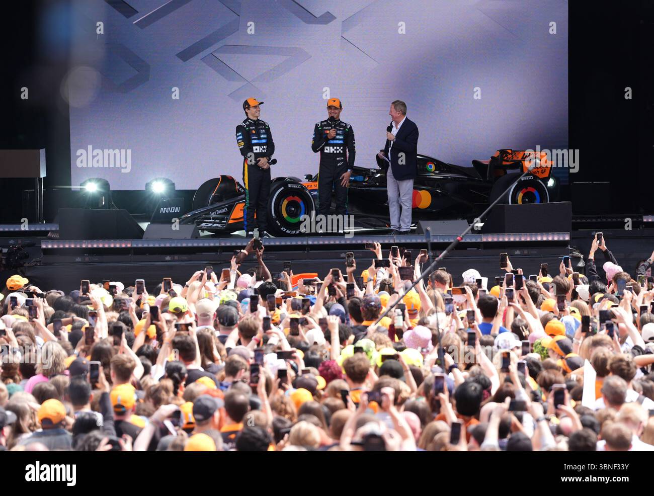 McLaren's Oscar Piastri, Lando Norris and presenter Martin Brundle ...
