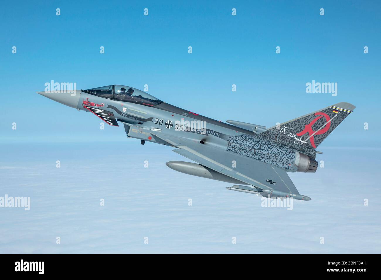 The Eurofighter EF-2000 Typhoon S (Reg. 3090) of the German Air Force flies in-flight above ...