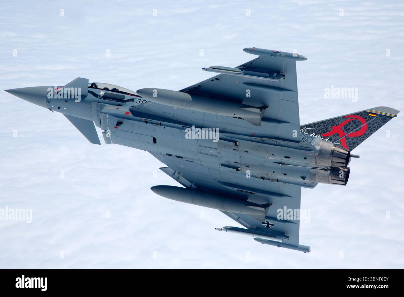 The Eurofighter EF-2000 Typhoon S, tail number 3090, banks sharply over ...
