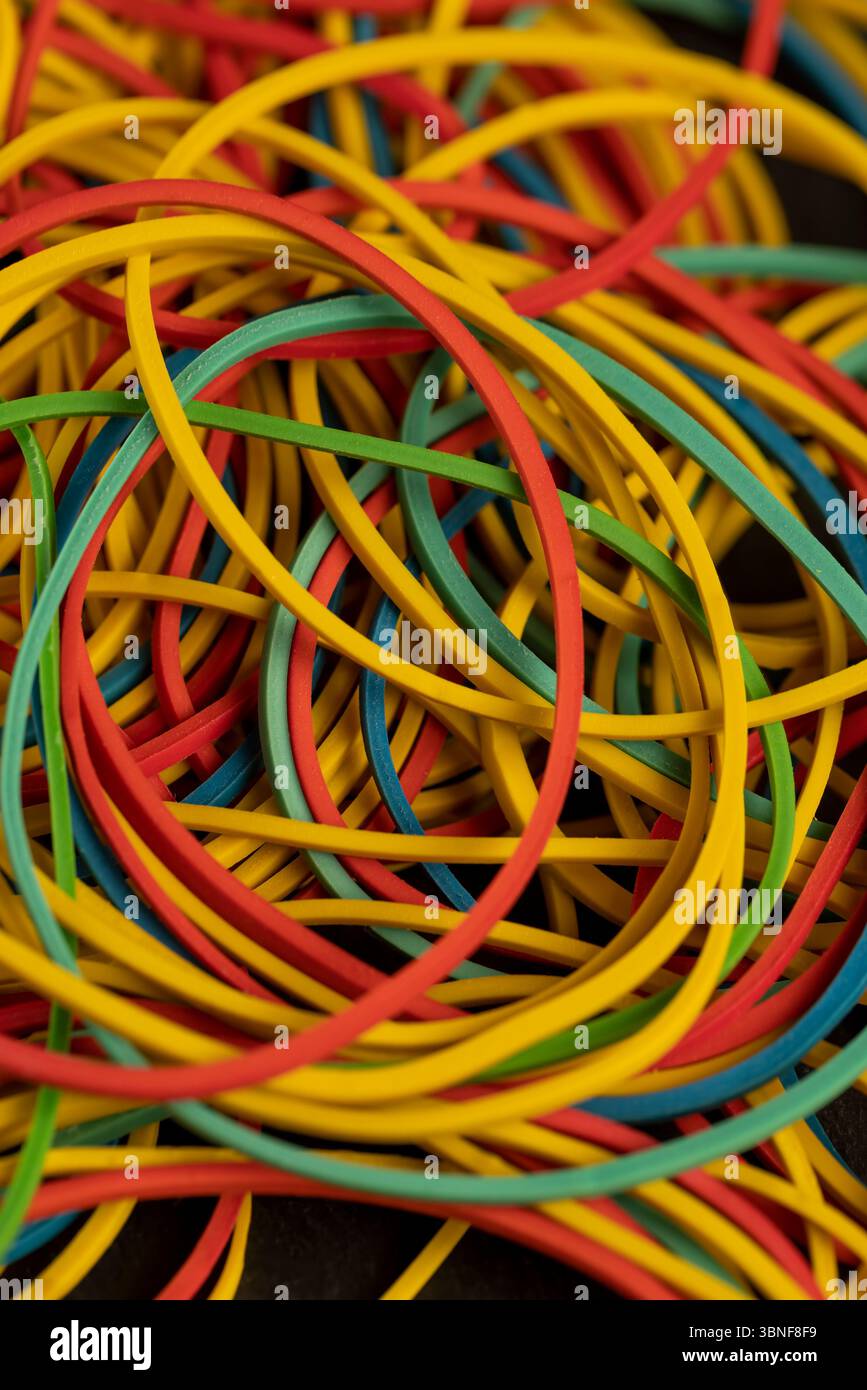 rubber bands for money packaging, scattered rubber bands of different ...