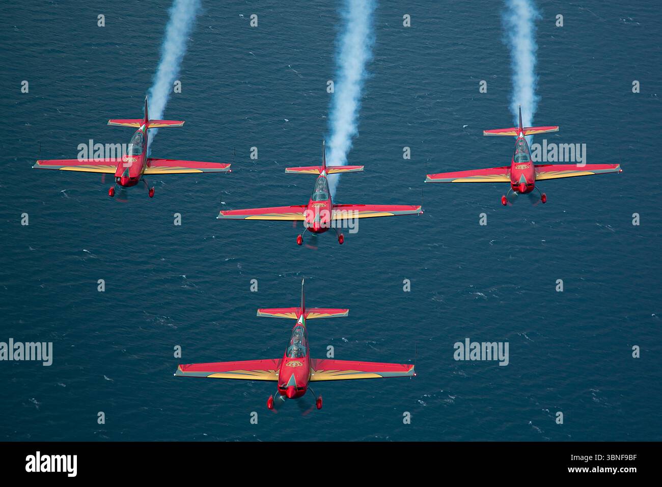 The Royal Jordanian Falcons, flying Extra 330LX aircraft, perform a ...