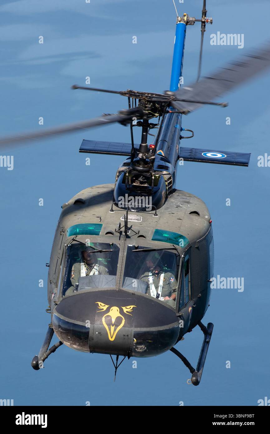 The UH-1H Iroquois (Reg. ES611), commonly known as the Huey, serves as ...