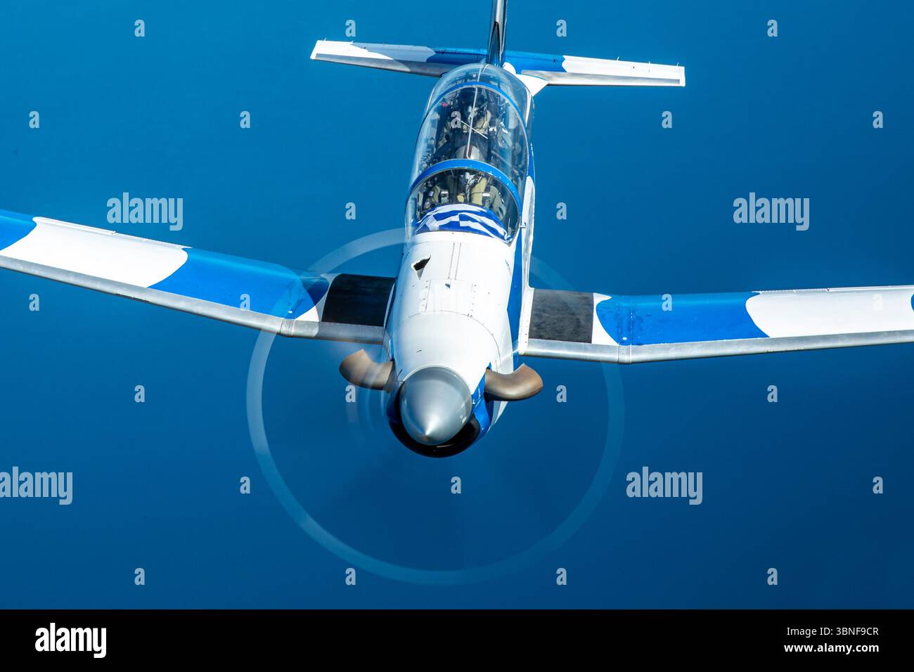 Photographed mid‑turn above Greece, a Hellenic Air Force Raytheon T‑6A ...