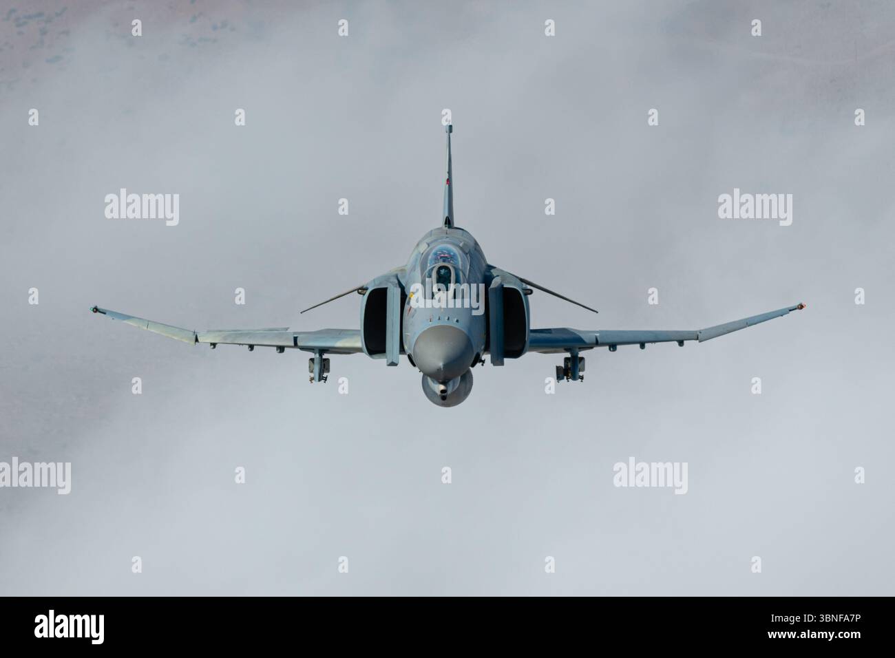 The McDonnell Douglas F-4E AUP Phantom II (Reg. 01518) of the Greek Hellenic Air Force is a ...