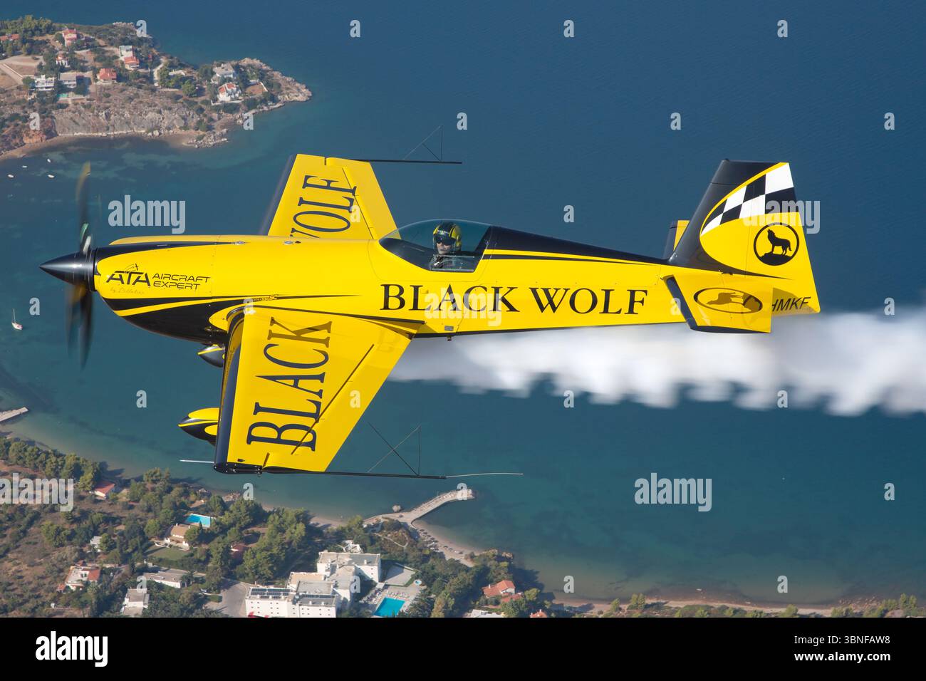 Front view of the Extra EA‑330SC “Black Wolf” (F‑HMKF) against Greek ...