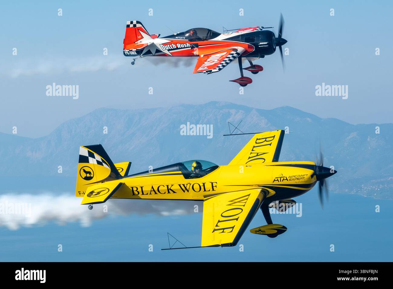 This photo captures the Black Wolf Extra EA-330SC, registration F-HMKF ...