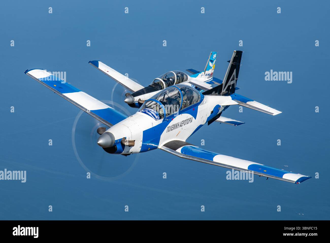 The Raytheon T-6A Texan II, tail numbers 036 and 037, are part of the ...