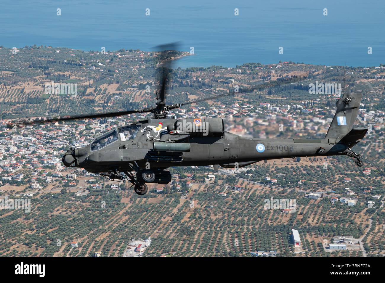 The Boeing AH-64DHA Apache, tail number ES1008, is a multirole attack ...