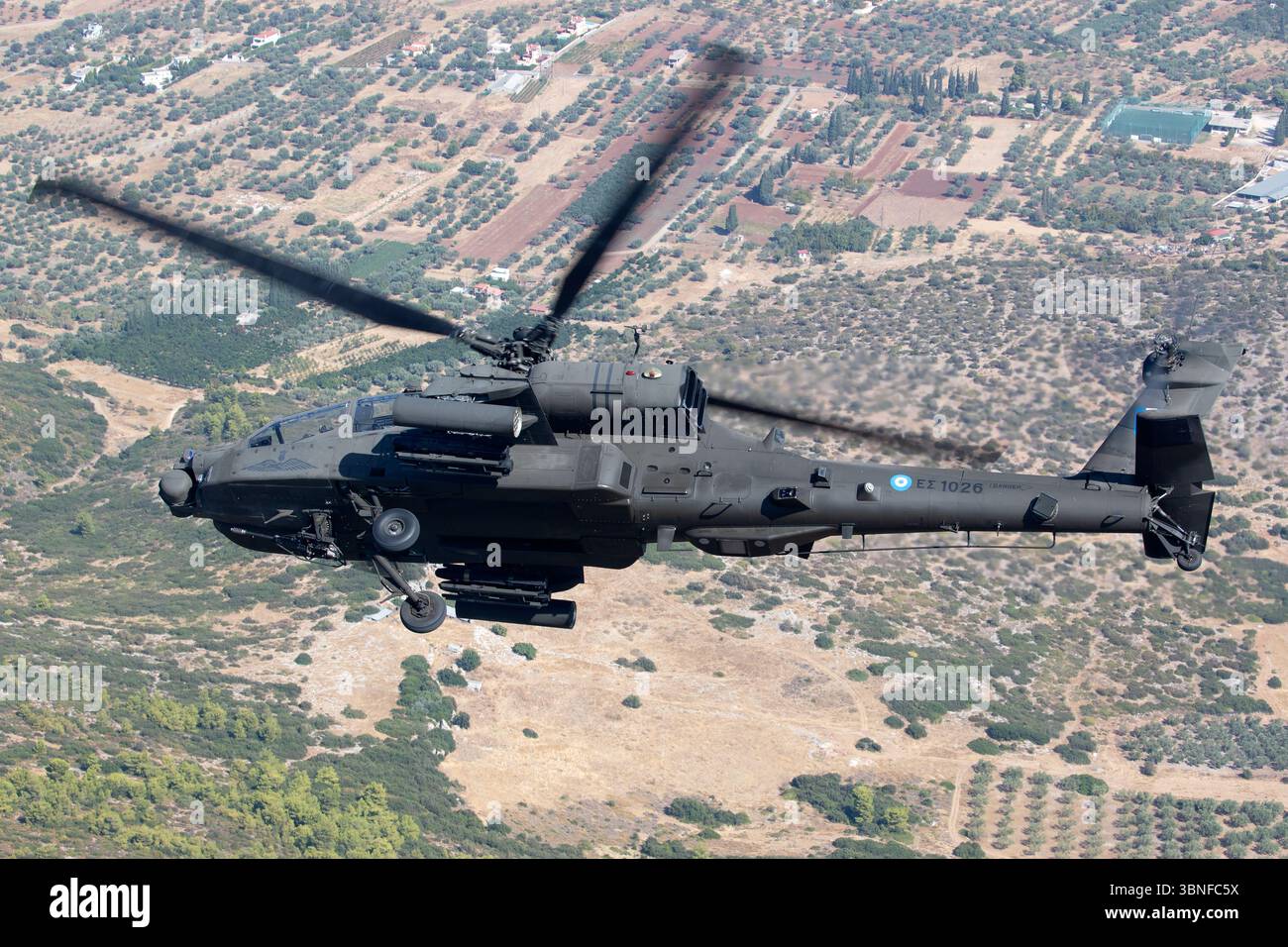 The AH-64DHA Apache (Reg. ES1026) of the Greek Hellenic Army is seen in ...