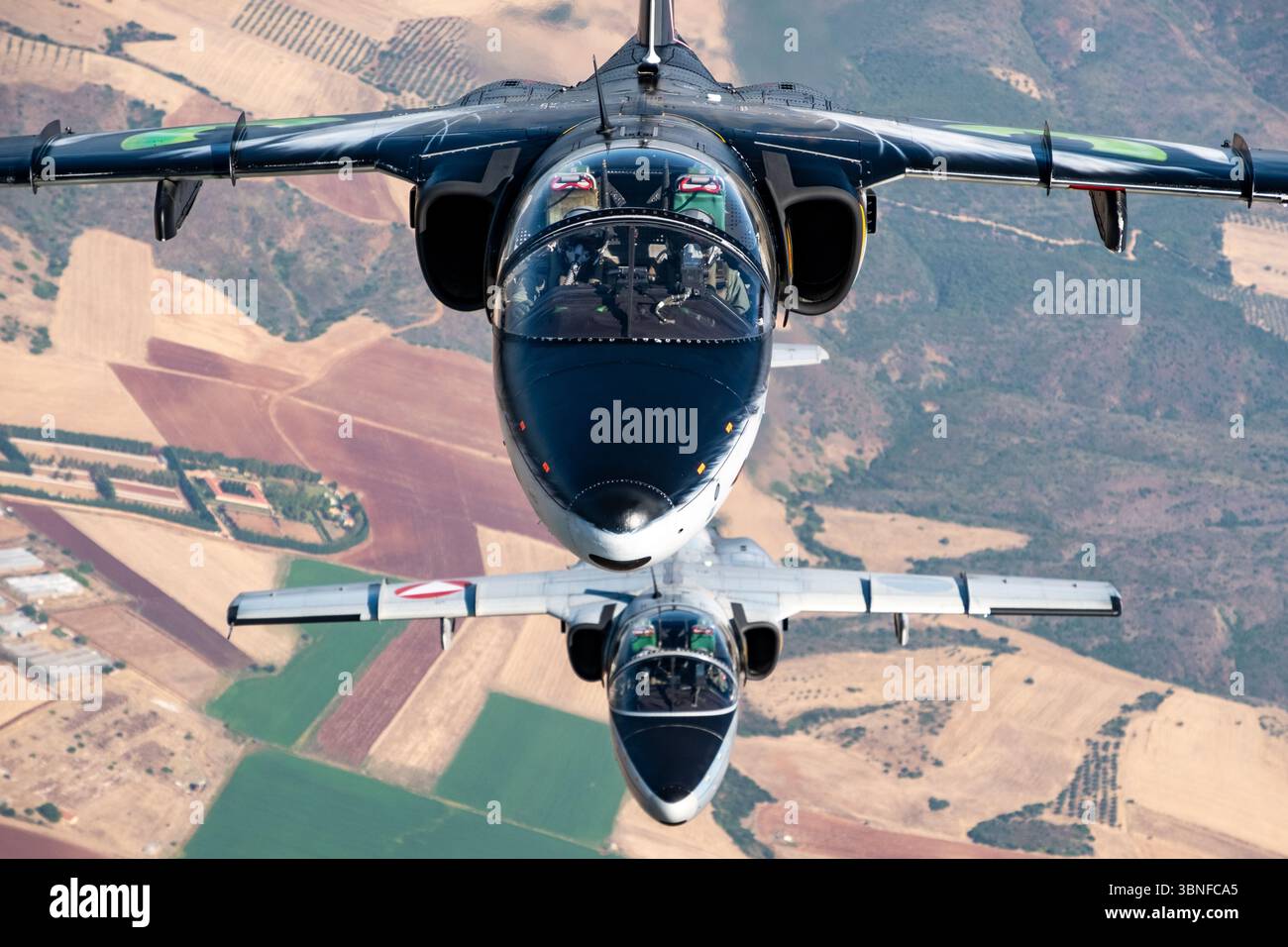This image showcases the Austrian Air Force Saab 105OE, with ...