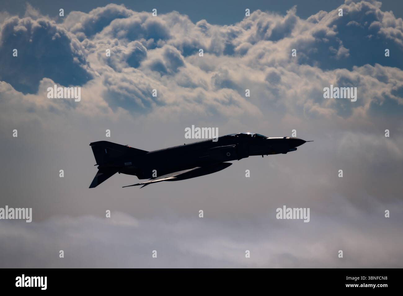 The silhouette of the Greek Hellenic Air Force McDonnell Douglas F-4E AUP Phantom II (Reg. 01518 ...