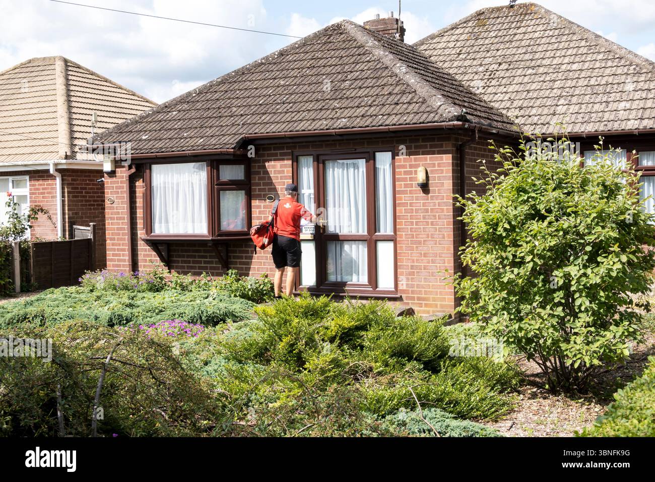 Royal Mail lady delivering post, Cherry Willingham, Lincoln ...
