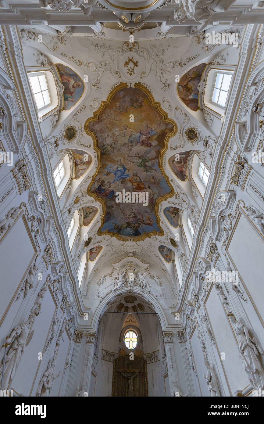 A breathtaking view of the ornate baroque ceiling inside the Church of ...