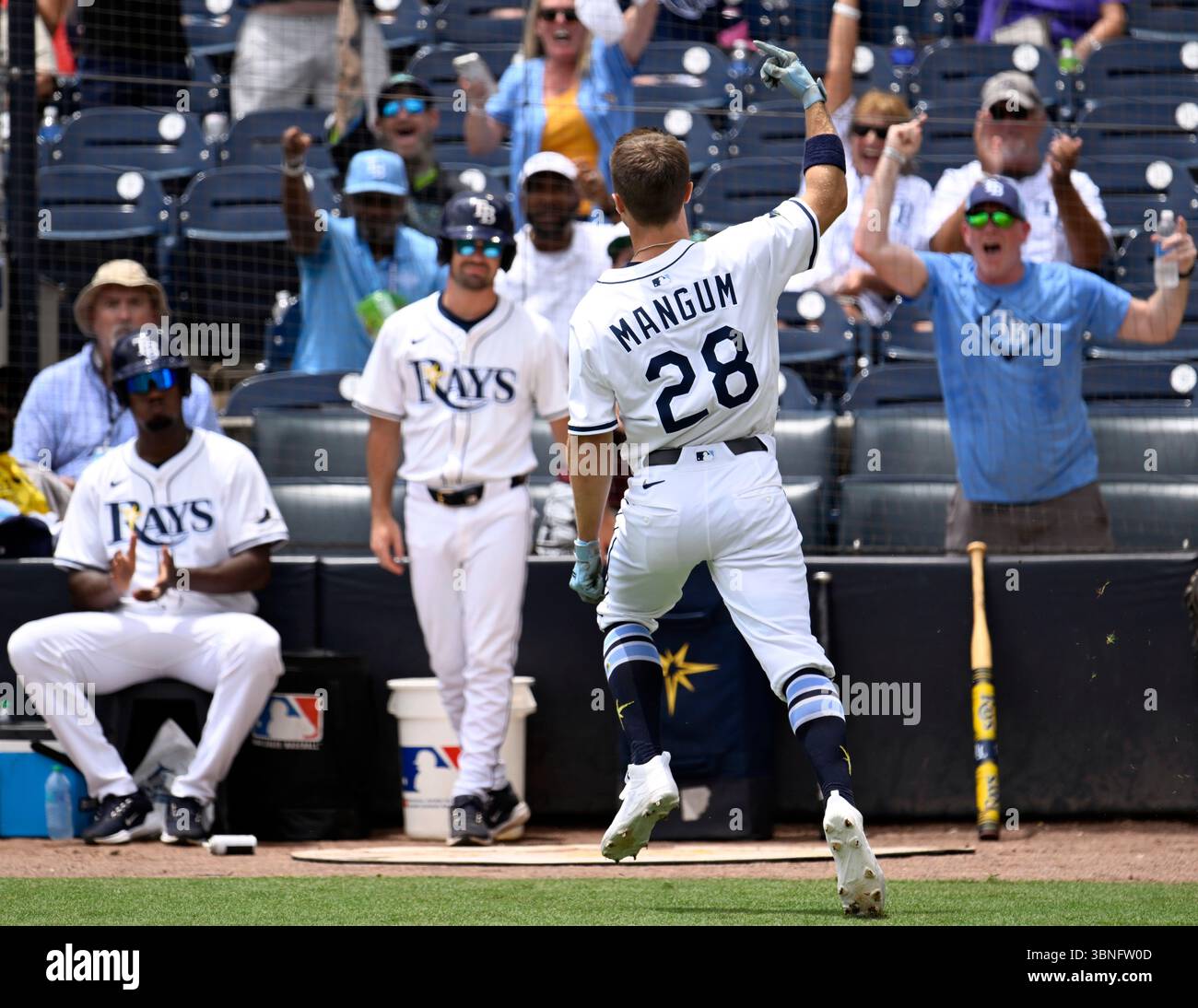 Tampa Bay Rays' Jake Mangum celebrates his inside-the-park home run ...
