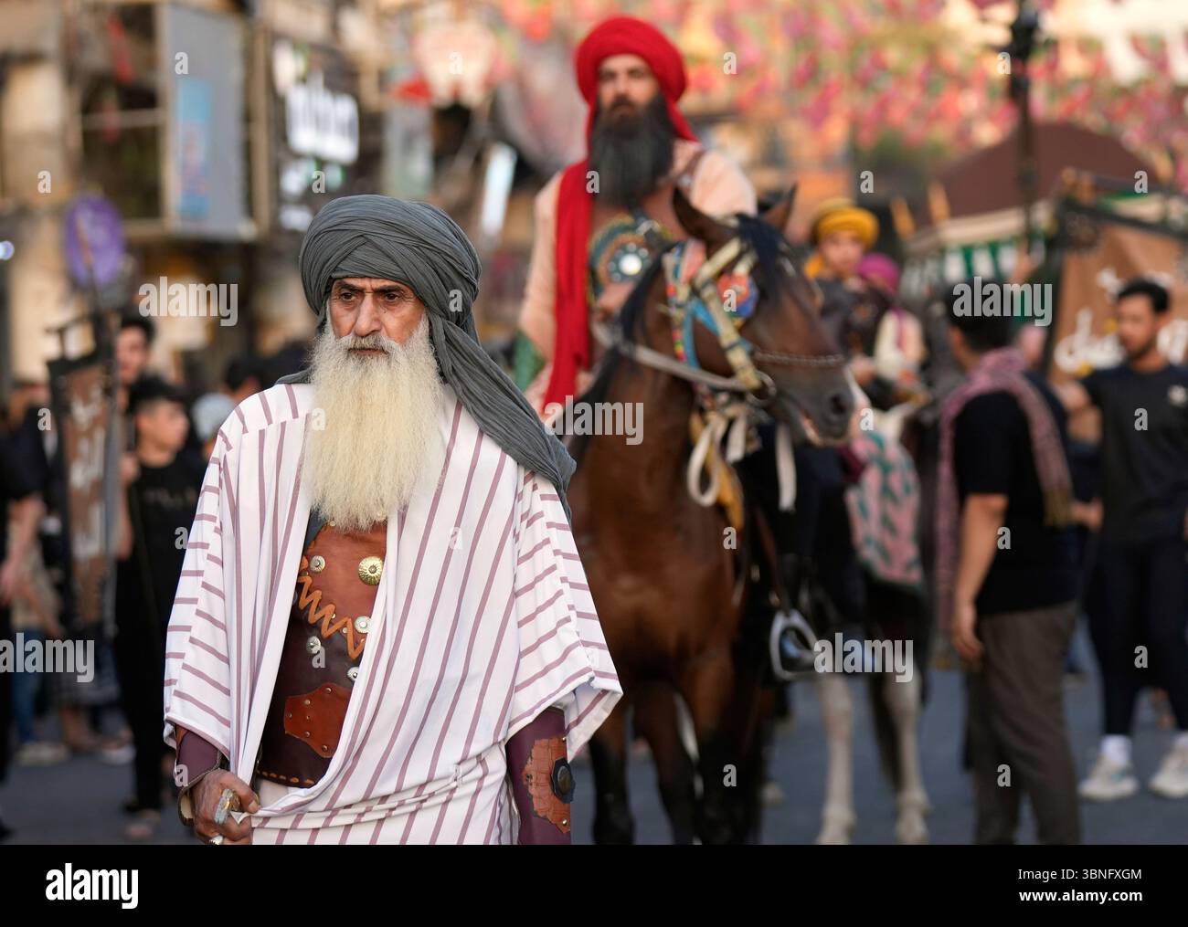 Iraqi Shiite wear traditional clothes to perform the epic of Imam ...