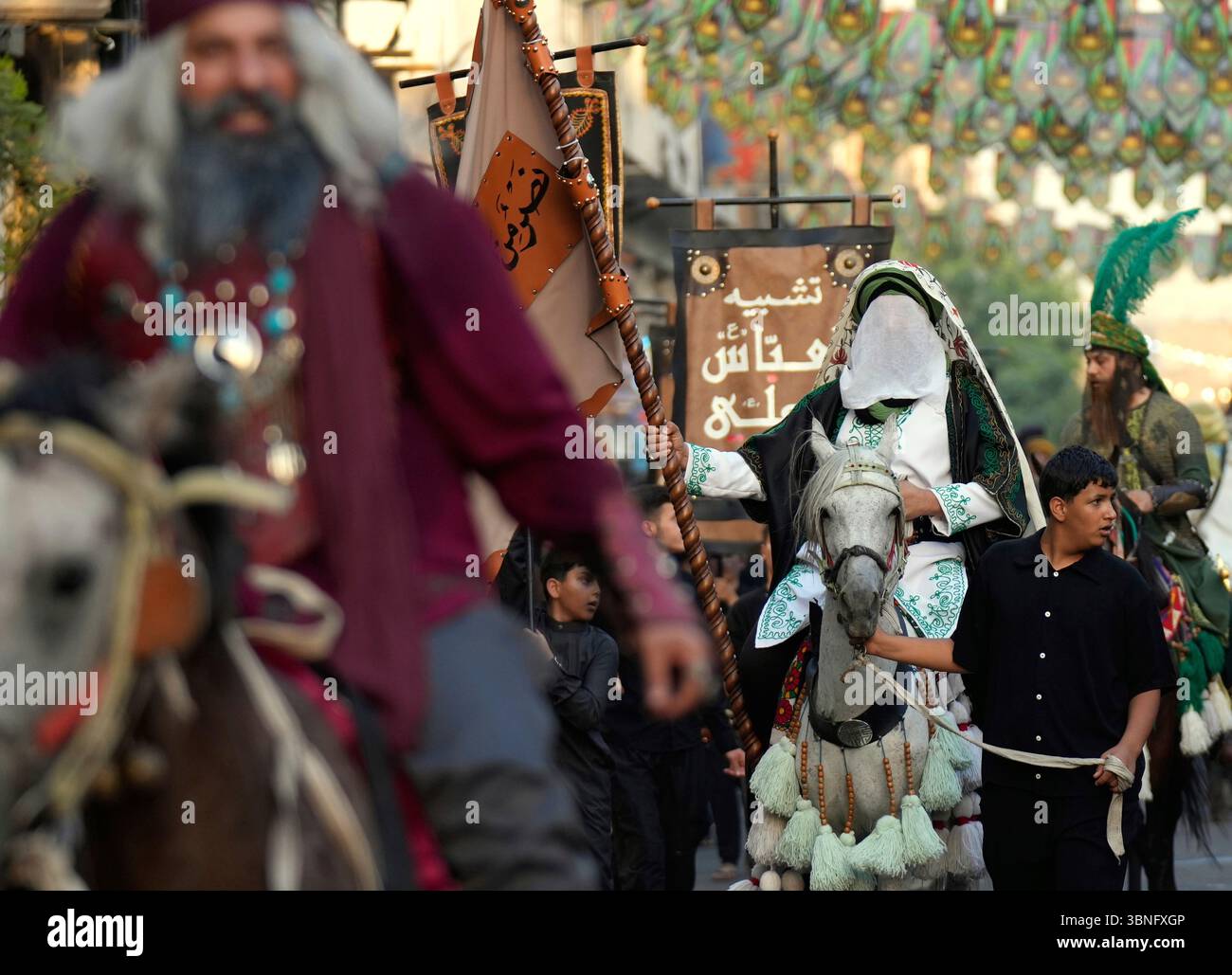 Iraqi Shiite wear traditional clothes to perform the epic of Imam ...