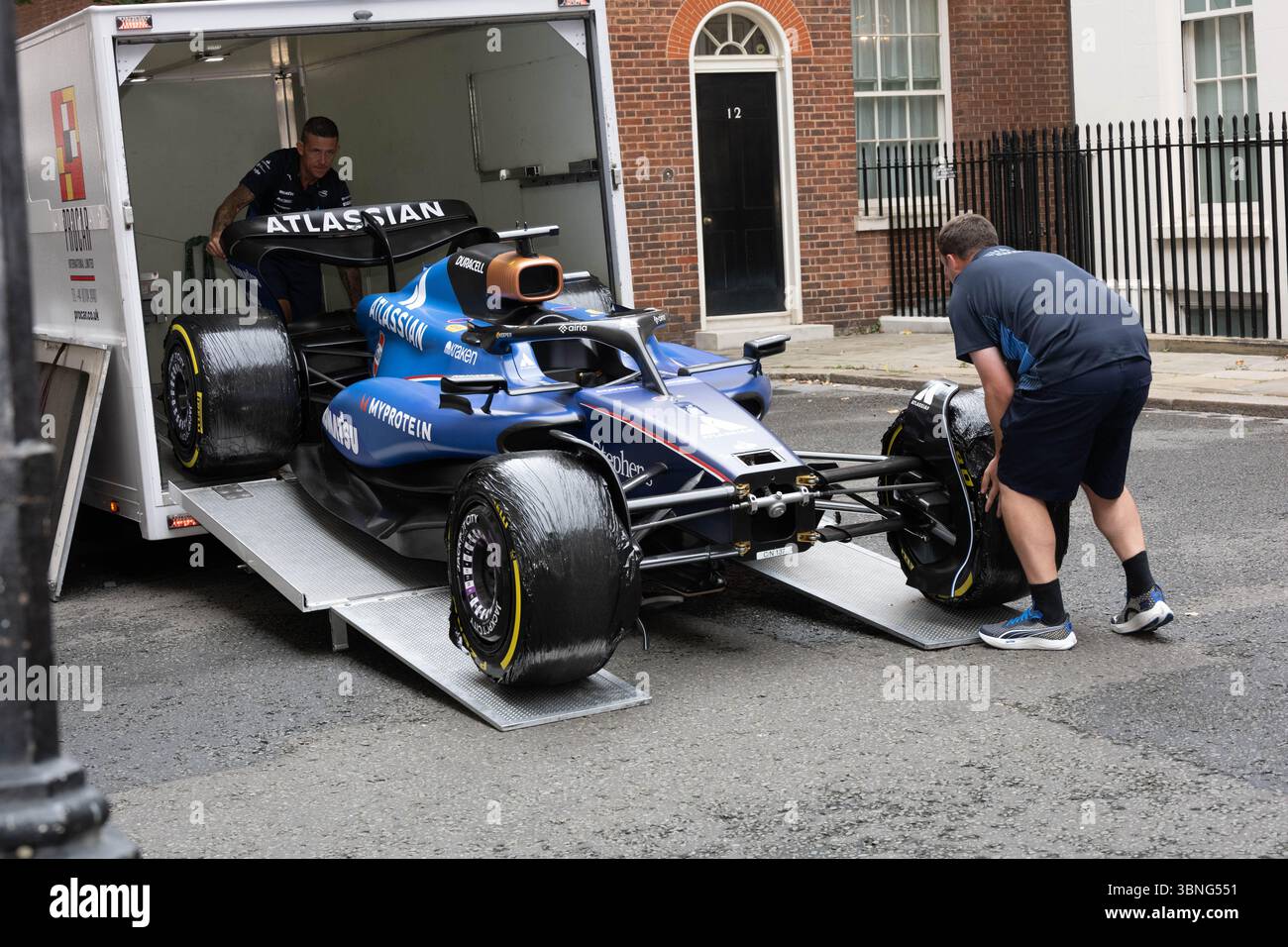 London, UK. 02nd July, 2025. Two F1 cars arrive in Downing Street as ...