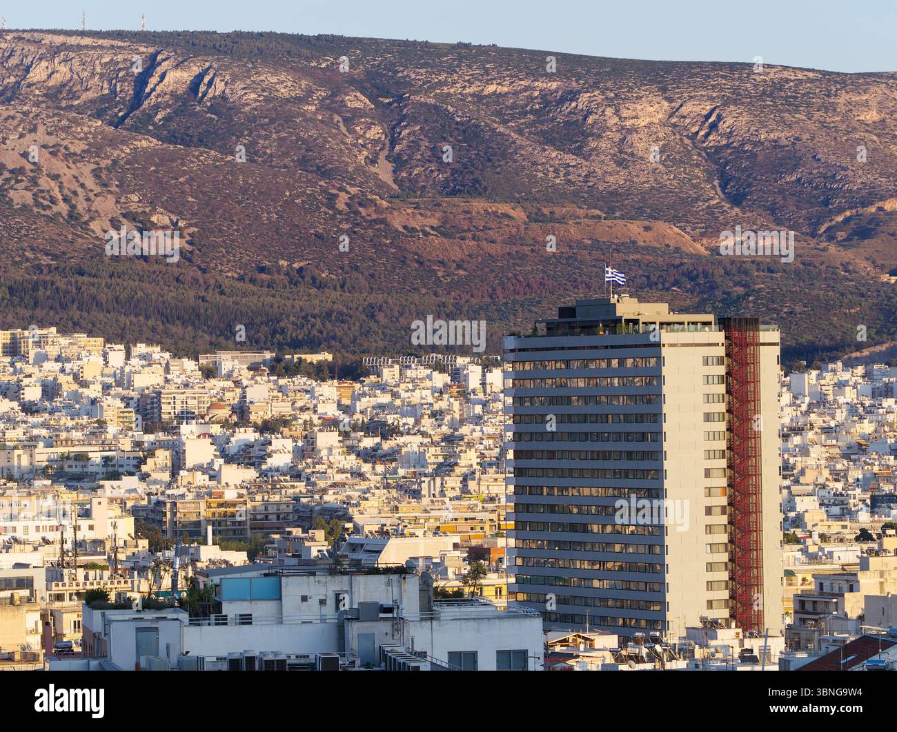 Landscape in Athens with skyscraper in view under sunset colors. Athens ...