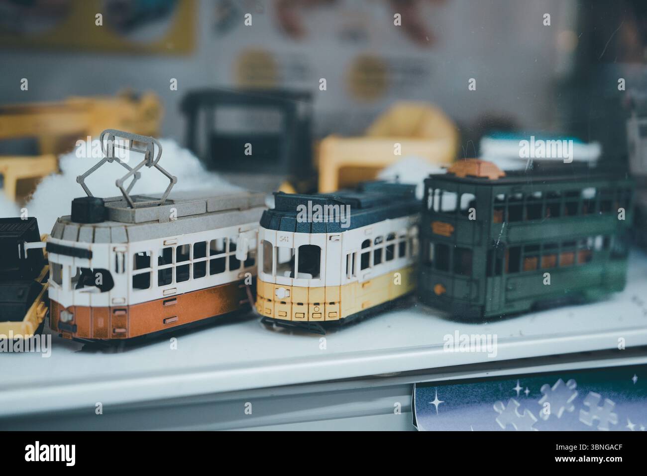 Colorful wooden tram models on display in a Tokyo gift shop Stock Photo ...