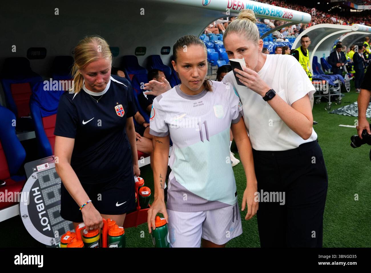 Norway head coach Gemma Grainger (right) speaks with player Guro Reiten ...