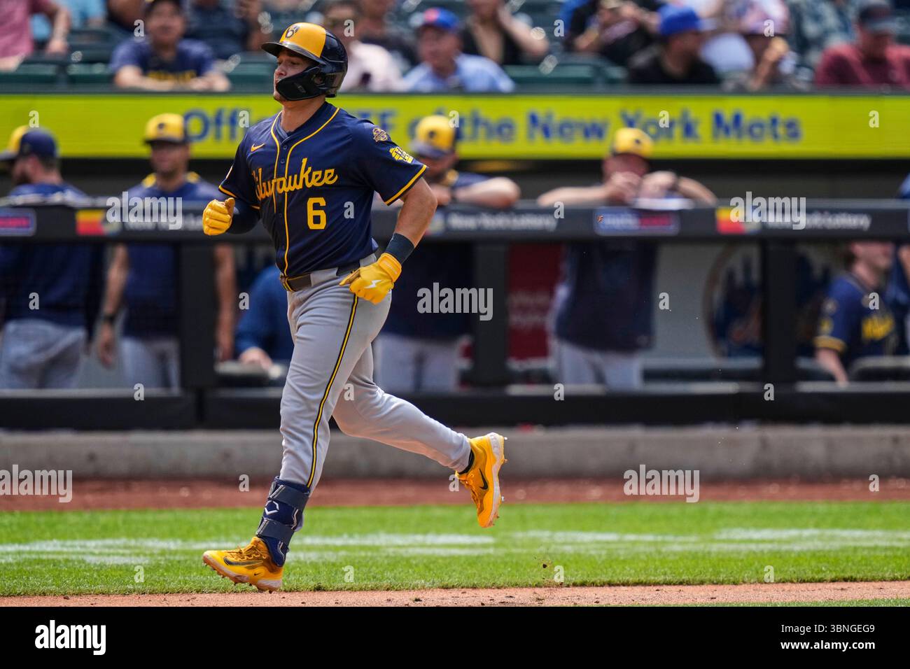 Milwaukee Brewers' Isaac Collins runs the bases after hitting a home ...