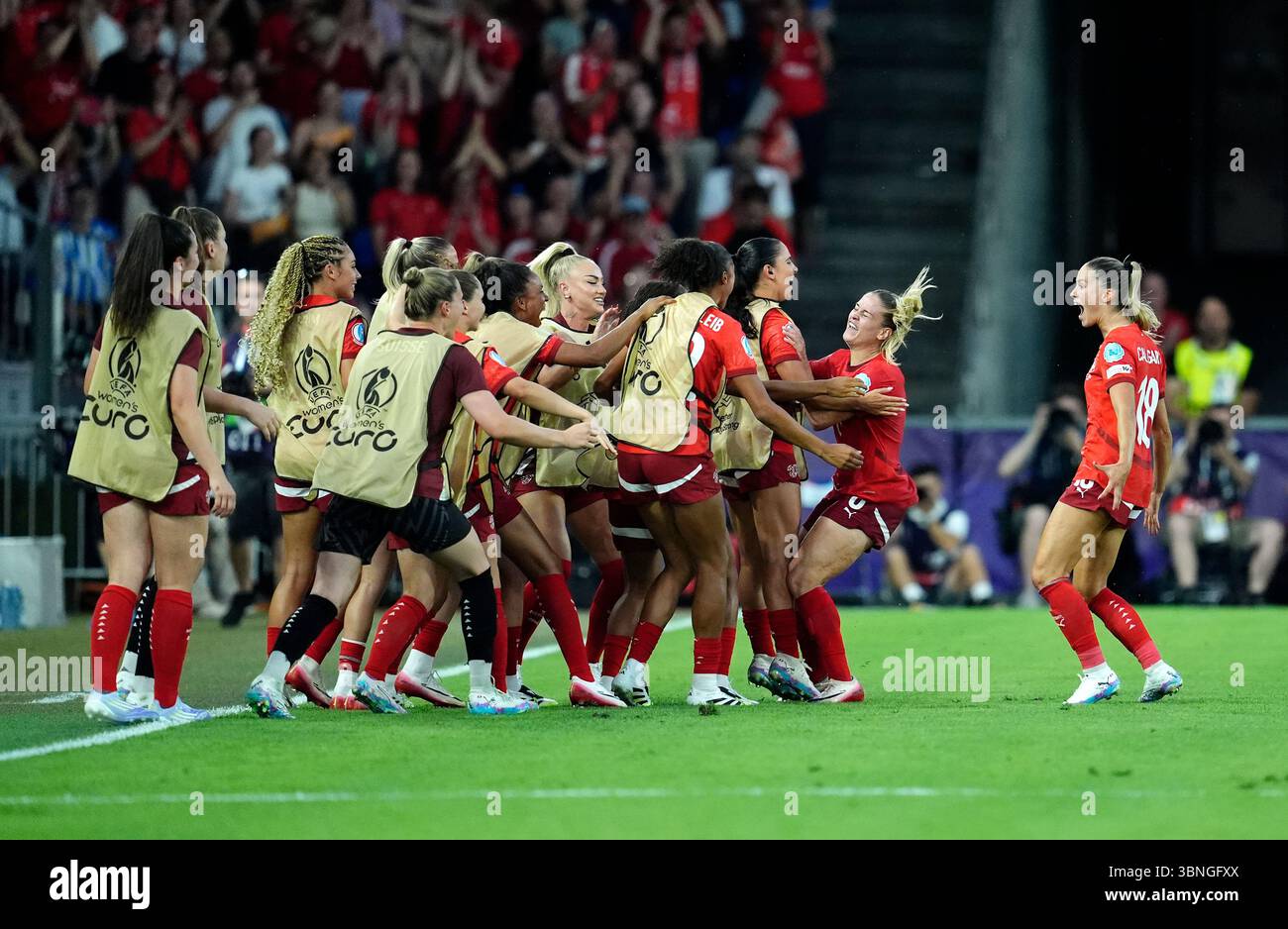 Switzerland's Nadine Riesen (second right) celebrates scoring their ...