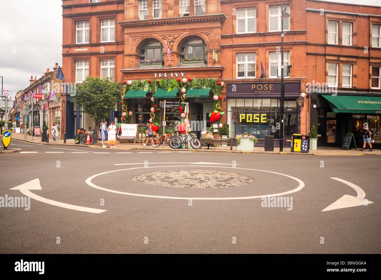 WIMBLEDON, LONDON- July 2, 2025: Tennis decorations and people in ...