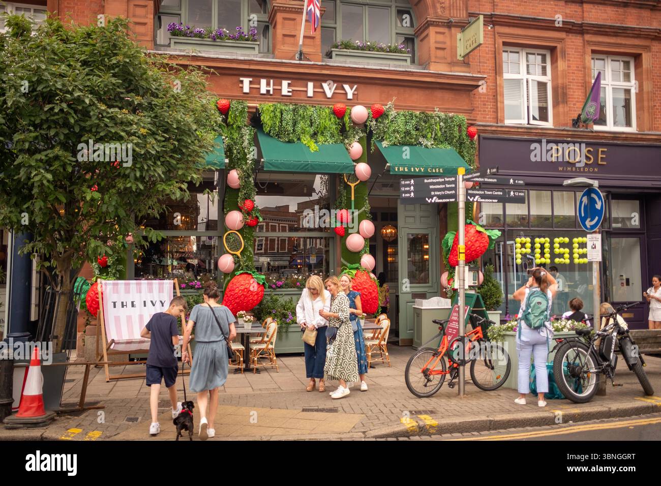 WIMBLEDON, LONDON- July 2, 2025: Tennis decorations and people in ...