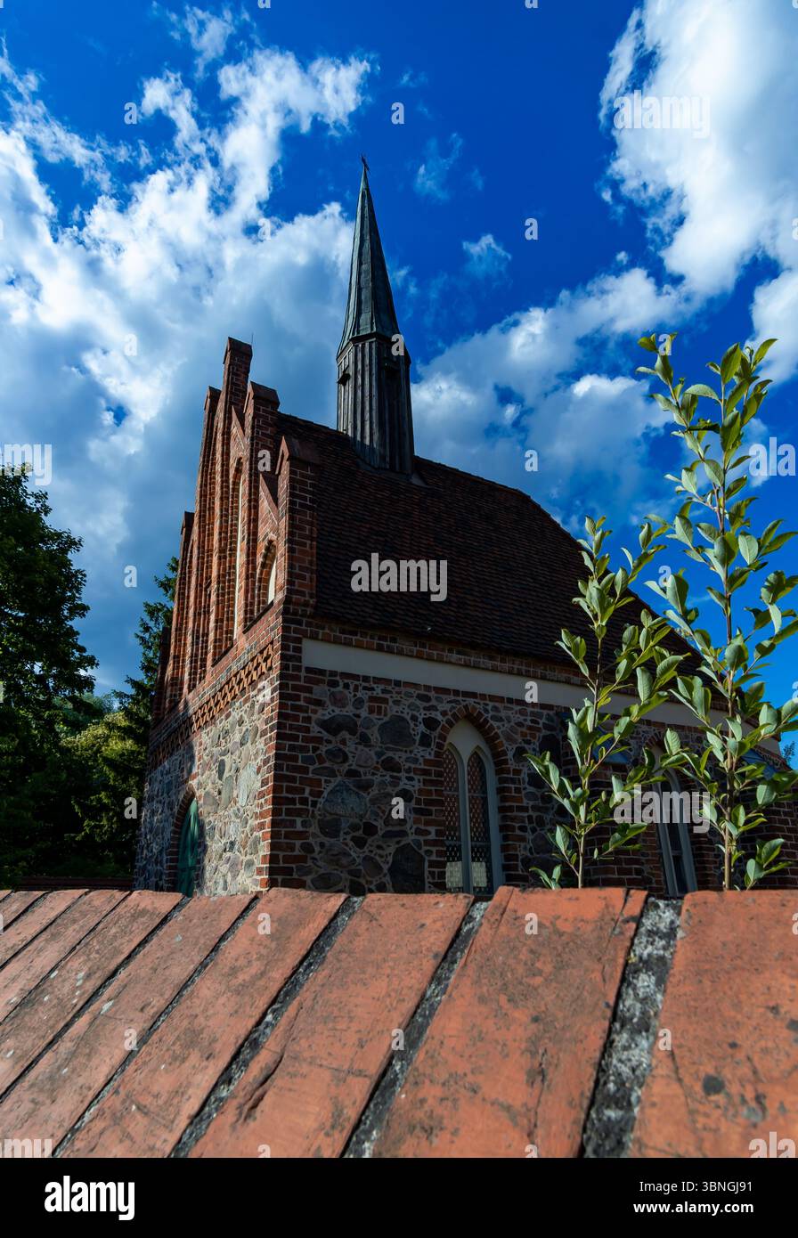 Historic St. Georgen Chapel in Bernau, Germany, seen behind a red brick ...
