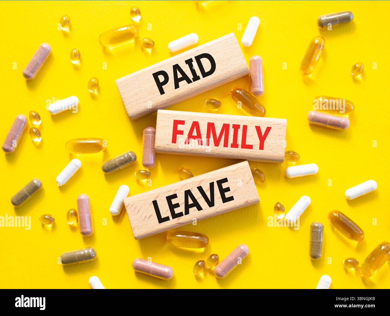 Paid Family Leave symbol. Concept words Paid Family Leave on wooden ...