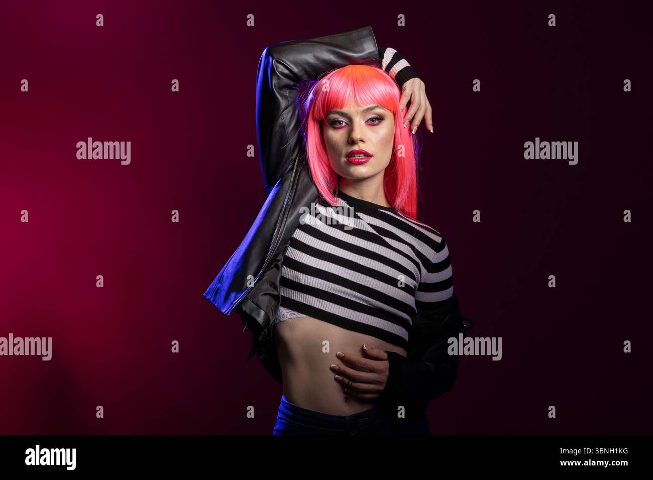 Strong elegant woman projects attitude in studio using bold expression ...